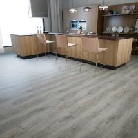 China Waterproof Click Lock Vinyl Plank Commercial Grade SPC Flooring with Wood Grain Finish for sale