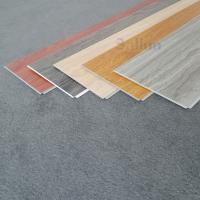 China Waterproof SPC Piso LVT Wood Texture Vinyl Plank Tiles with ISO9001/CE Certificate for sale
