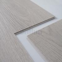 China Waterproof and Wear Resistant SPC Flooring in Gray Wood Veneer with Click Lock System for sale