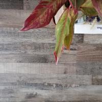 China SPC Flooring Modern Design Fireproof Luxury Vinyl Plank Interlocking Stone Wood Flooring for sale