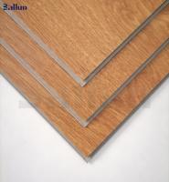 China Modern Design Style Embossed Texture PVC Virgin Material Plastic Vinyl Tiles SPC Flooring for sale