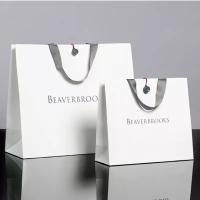 China Foldable White Kraft Paper Carrier Bags 44x13x32cm Custom Logo Eco-Friendly for sale