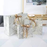 China Custom Printed Paper Gift Bags 157gsm 175gsm ISO Certified Wedding Packaging Carrier Bags for sale