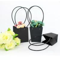 China Custom Kraft Paper Waterproof Bouquet Bags with Handles 20x10x13.5 cm for Florist Gift for sale