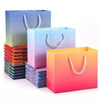 China FSC Certified 110gsm 120gsm Paper Bag Packaging for Clothes Waterproofing for sale