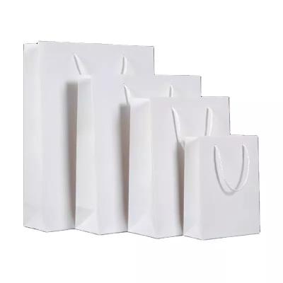 China Custom Printed Kraft Paper Gift Bags with Handles 350gsm Grocery Carrier Bags for sale