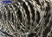 China Galvanized Steel CBT-65 Barbed Concertina Wire Coil for sale