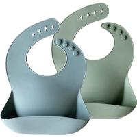 China Molding In One Adjustable Waterproof Feeding Bibs With Food Catcher Pocket for sale