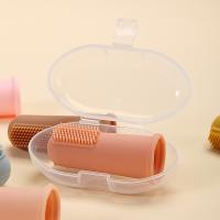 China Apricot Baby Silicone Products Soft Finger Toothbrush With Packaging Box for sale