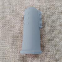China Apricot Baby Silicone Products Soft Finger Toothbrush With Packaging Box for sale