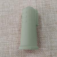 China Apricot Baby Silicone Products Soft Finger Toothbrush With Packaging Box for sale