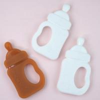 China FDA BPA Free Baby Silicone Products Milk Bottle Teether Toy 10.5*5.5*1.5cm With Box for sale