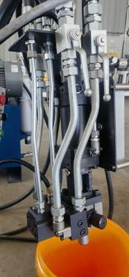 China High Pressure Polyurethane Foam Injection L Type Mixing Head with 100-200 Bar Operating Pressure and Self-Cleaning Design for sale