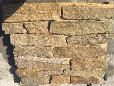 China Tiger Skin Yellow Granite Field Stone Random Veneer Natural Stone Cladding 2-3.5cm Thick for sale
