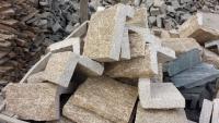 China Yellow Granite Retaining Wall Natural Stone Cladding Granite Backsplash Wall Corner Stone for sale