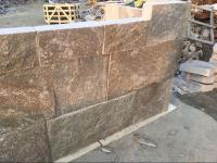China Yellow Granite Retaining Wall Natural Stone Cladding Granite Backsplash Wall Corner Stone for sale