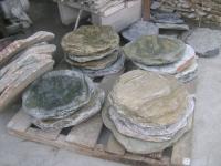 China Natural Oyster Stepping Stone Yellow Quartzite Garden Paving Round Stone 30-60cm for sale
