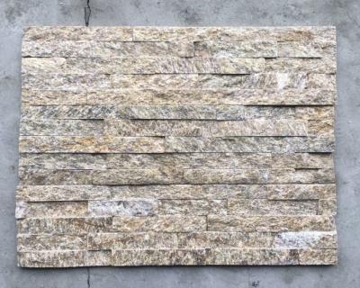 China Yellow Granite Culture Stone Fireplace Thin Stone Veneer Natural Stacked Stone Wall 600x150mm for sale