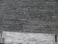 China Black Slate Waterfall Ledgestone 600x150mm Natural Split Wall Panel for sale