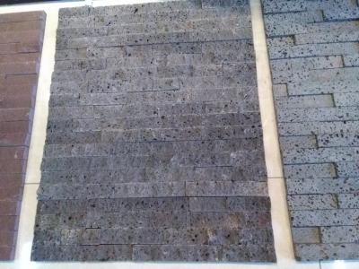 China Dark Grey Basalt Culture Stone 600x150mm Volcanic Rock Stacked Stone Panel Outdoor Wall Veneer for sale