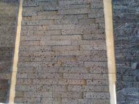 China Dark Grey Basalt Culture Stone 600x150mm Volcanic Rock Stacked Stone Panel Outdoor Wall Veneer for sale