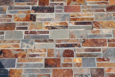 China Rusty Split Face Slate Stacked Stone Beveled Edges Multicolor Culture Stone 600x150mm Outdoor Ledger Panels for sale