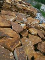 China Multicolor Slate Retaining Wall Stone 30-50cm Natural Rustic Flagstone for Landscaping for sale