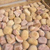 China Yellow Sandstone Pebble Wall Stone 10-25cm Natural Landscaping Pebble for Wall Cladding for sale