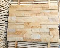 China Yellow Wooden Sandstone Wall Panels Natural Culture Stone 600x150mm Ledgestone for sale