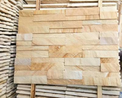 China Yellow Wooden Sandstone Wall Panels Natural Culture Stone 600x150mm Ledgestone for sale
