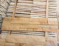 China Yellow Wooden Sandstone Wall Panels Natural Culture Stone 600x150mm Ledgestone for sale