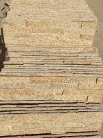 China Tiger Skin Yellow Granite Ledgestone Natural Stacked Stone Veneer 600x150x15-25mm Wall Cladding for sale