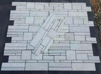 China Snow White Quartzite Culture Stone Flamed Ledgestone 600x150mm Natural Stone Cladding for sale