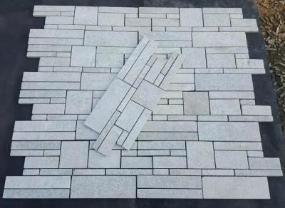 China Snow White Quartzite Culture Stone Flamed Ledgestone 600x150mm Natural Stone Cladding for sale