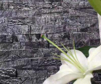 China Black Wooden Marble Culture Stone 600x150mm Natural Split Ledgestone Veneer for Wall Cladding for sale