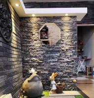 China Black Wooden Marble Culture Stone 600x150mm Natural Split Ledgestone Veneer for Wall Cladding for sale