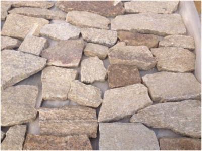 China Sesame Yellow Granite Random Flagstone 30-50cm Natural Paving Stone for Landscaping for sale