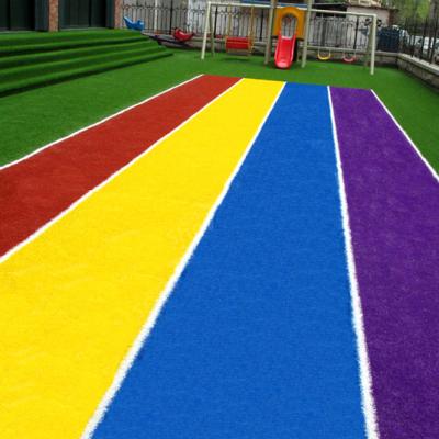 China Rainbow Coloured Fake Grass For School Playground 25mm Pile CE Standard for sale