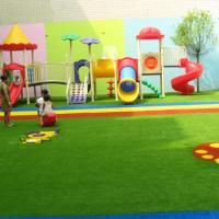 China Rainbow Plastic Kids Blue Artificial Grass Carpet Mat For Kindergarten Play Area for sale