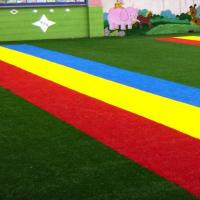 China Rainbow Plastic Kids Blue Artificial Grass Carpet Mat For Kindergarten Play Area for sale
