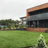 China Water Proof Laying Synthetic Grass With Drainage Holes Outside Inside Decoration for sale