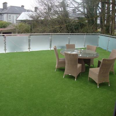 China Artificial Fake Turf Carpet In Realistic Surface Roof Top Beautiful Landsaping for sale