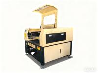 China Jigsaw Puzzle Wood CO2 Laser Cutter 9060 Precision Cutting Non Metallic Craft Customization for sale