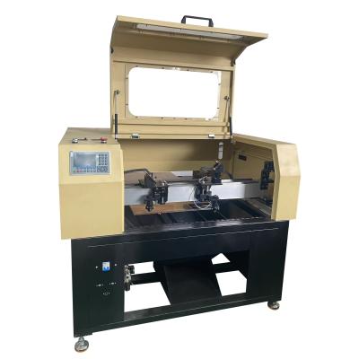 China 150W Automatic Multifunctional CO2 Laser Cutting Machine for Non-Metallic Materials for sale