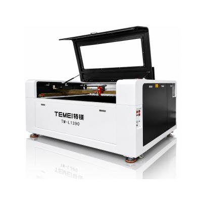 China 1390 CO2 Laser Tube Cutting Machine 150W－300W Laser Cutting Machine Water Cooling for sale
