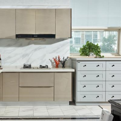 China Free Design China Made High Gloss Lacquer Painting PVC Kitchen Cabinets for sale