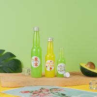 China Mini Juice Bottles Unique Shaped Juice Shot Bottles With Clear Handle for sale