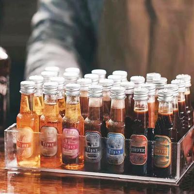 China Custom 200Ml Transparent Round Empty Plastic Liquor Wine Whisky Vodka Tequila Bottle With Cap for sale