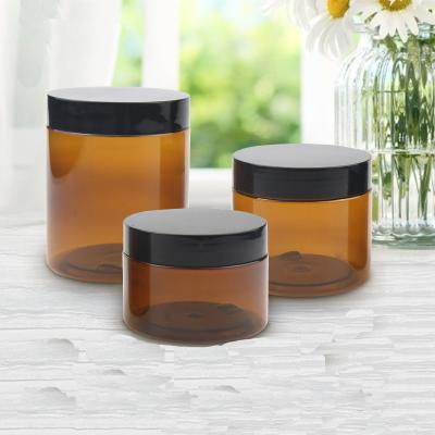 China Fast Shipping Plastic Jar for Cosmetic Amber Food Quality Bottle Pet Bottles with Screw Black Cap with Custom Designs for sale
