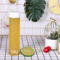 China Modern Milk Tea Bottles Plastic Screw on Lid Durable Leak Proof Design Ideal for Beverage Packaging and Storage Solutions for sale